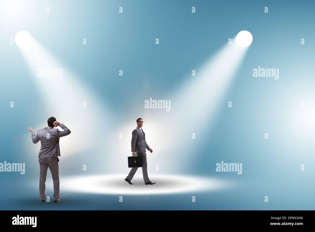 Business people under the spotlight concept Stock Photo - Alamy