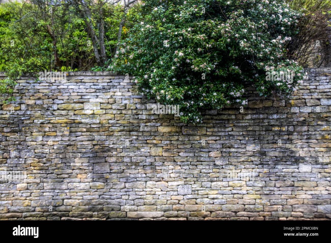 A traditional stone wall in a rural area of Gloucestershire, UK Stock ...