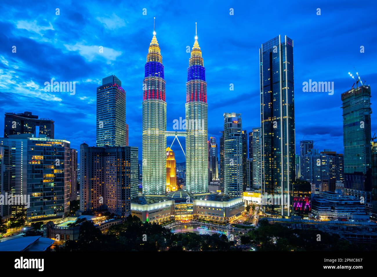 Petronas Twin Towers skyscrapers KLCC skyline at twilight landmark in ...