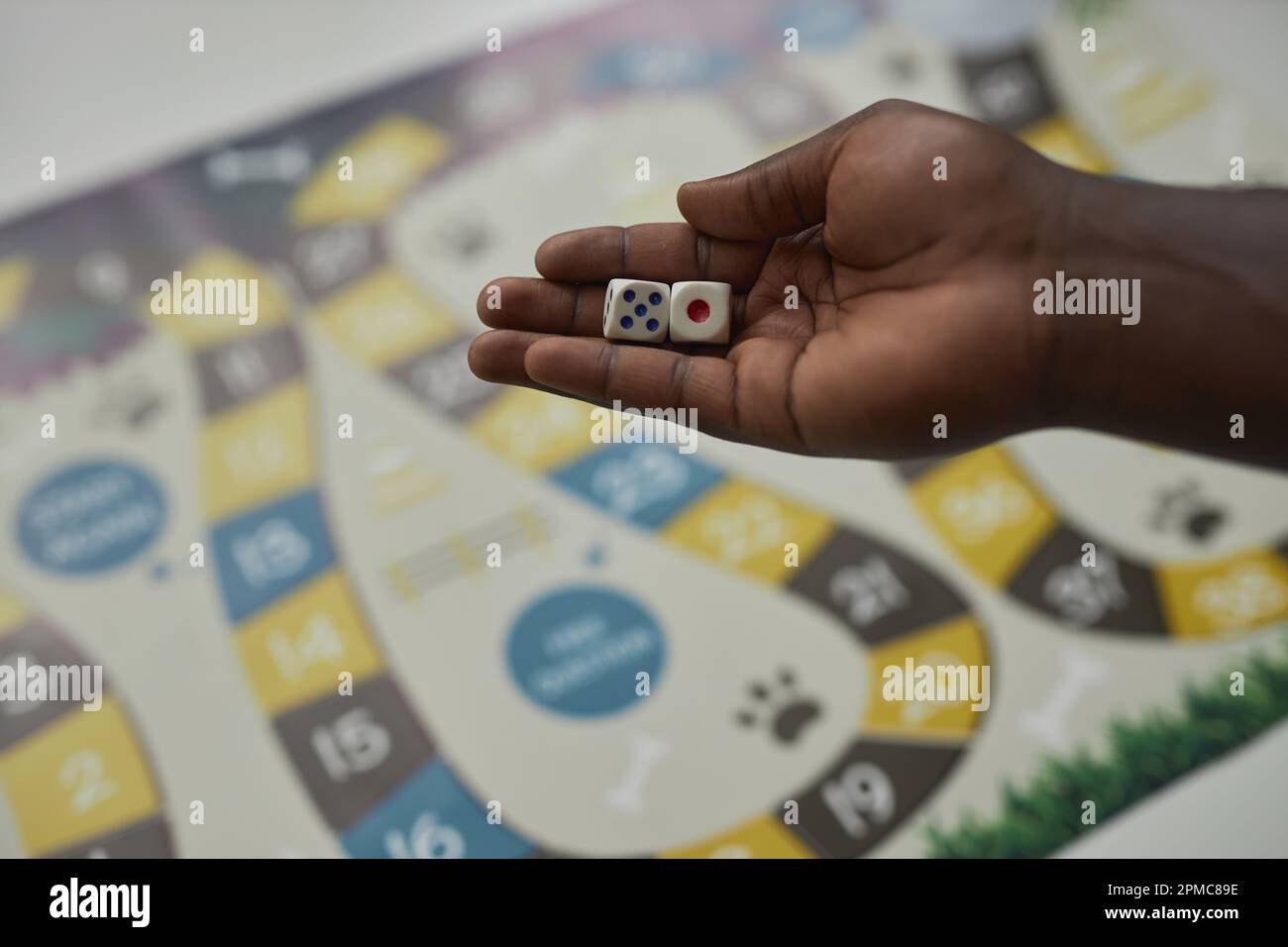 Hand in throwing dice hi-res stock photography and images - Alamy