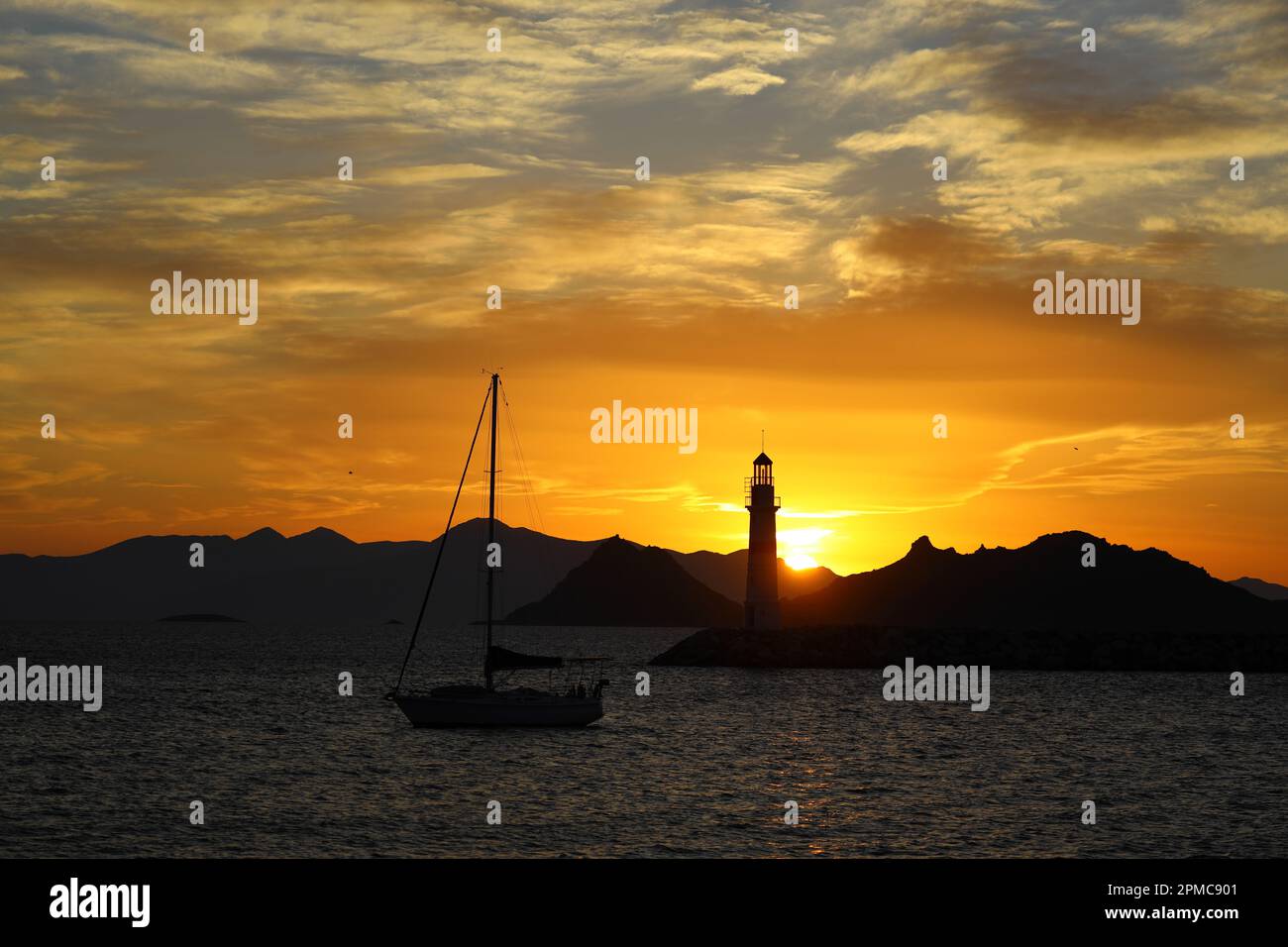 Seascape at sunshine. Lighthouse and sailings on the coast. Seaside ...