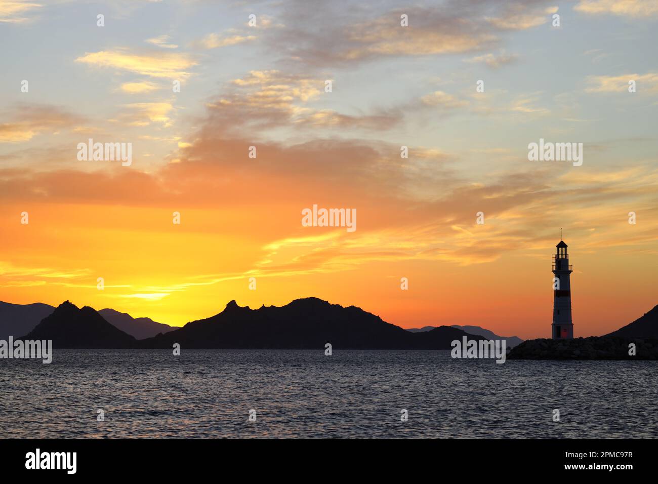 Seascape at sunshine. Lighthouse and sailings on the coast. Seaside ...