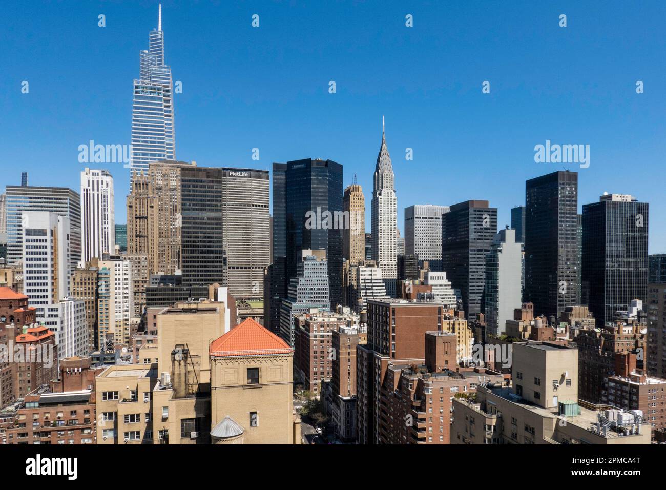 Skyline of mid Manhattan, seen from a rooftop garden in Murray Hill ...