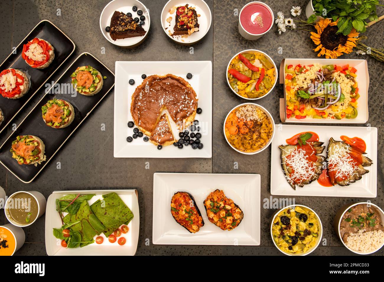 Set of Spanish style healthy food dishes on plates and delivery ...