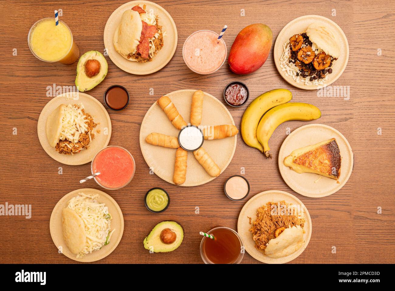 set of venezuelan fast food dishes with many assorted arepas on a ...