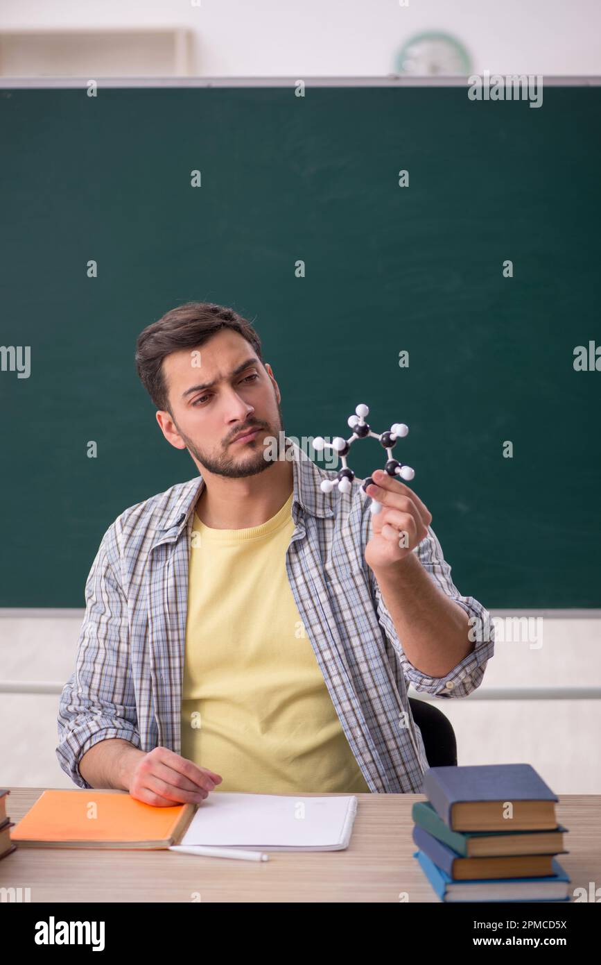 Young physicist student in the classroom Stock Photo - Alamy