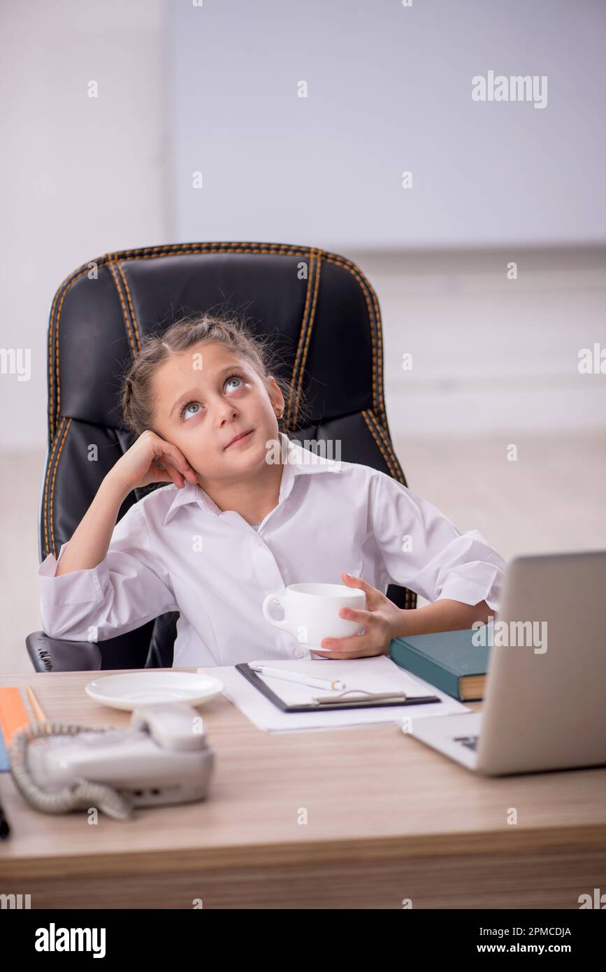 Little girl sitting in the classroom Stock Photo - Alamy