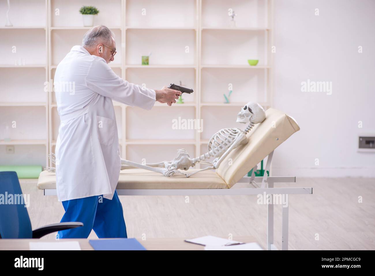 Old male doctor and skeleton patient at the hospital Stock Photo - Alamy