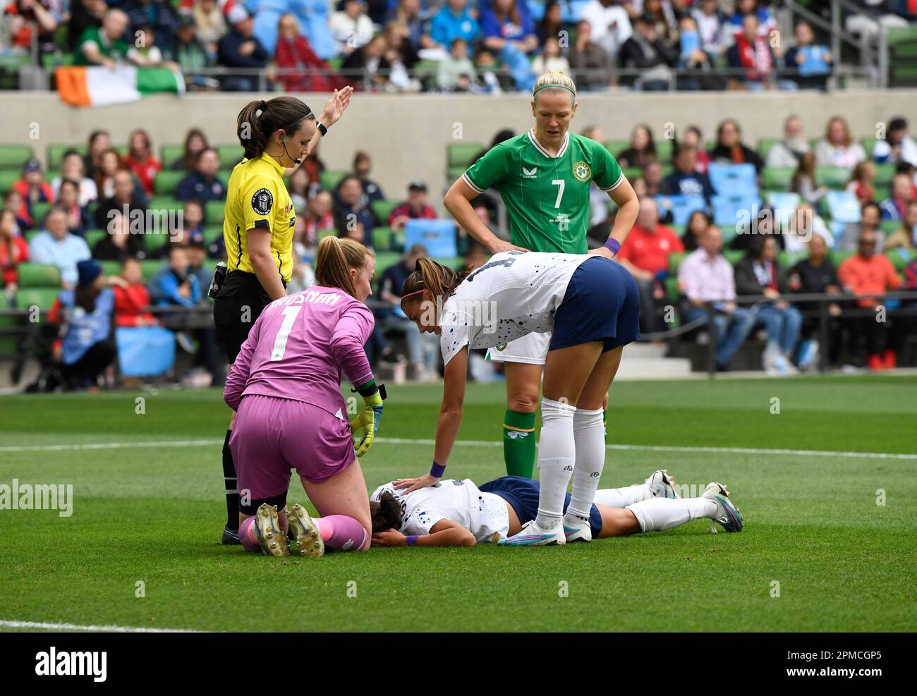 U.S. player ALEX MORGAN comforts a slightly injured player during the ...