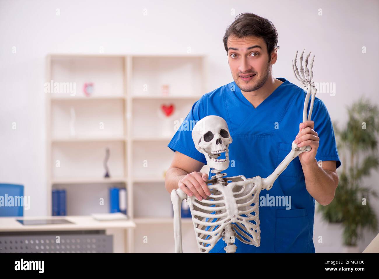 Young doctor and skeleton patient at the hospital Stock Photo - Alamy
