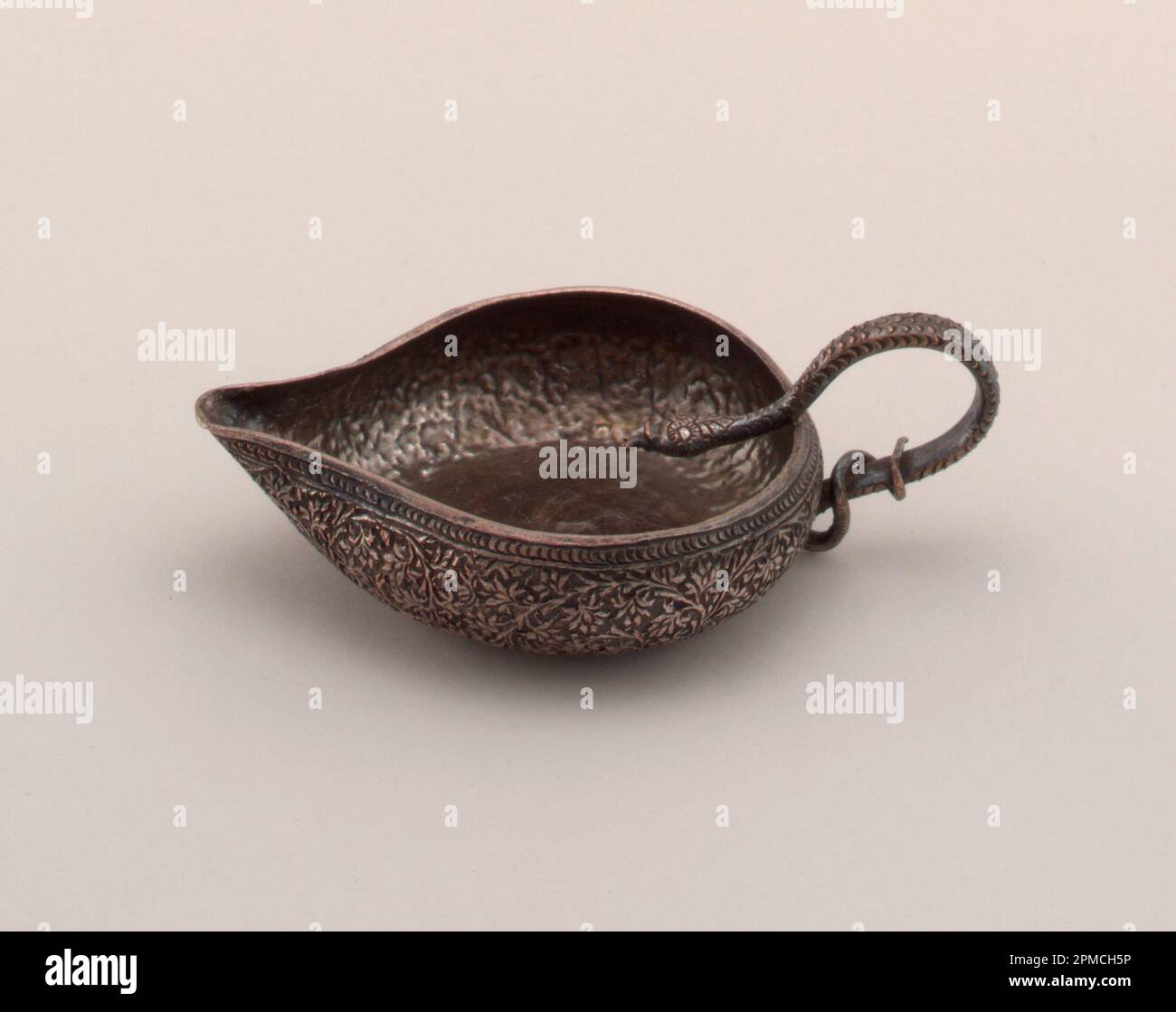 Oil Lamp (possibly India); raised, repoussé, chased silver Stock Photo ...