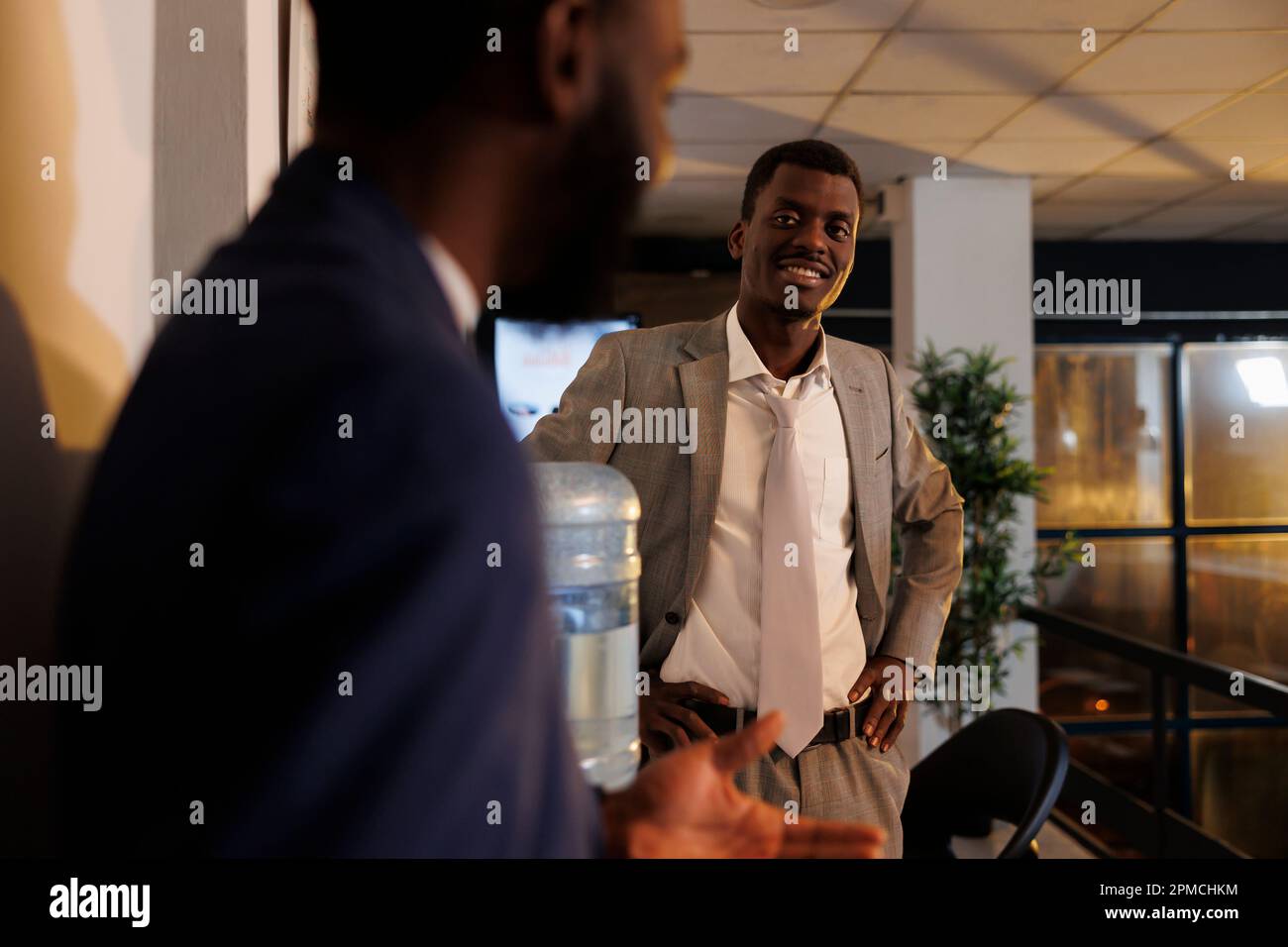 Businessman explaining marketing strategy to coworker during break time ...