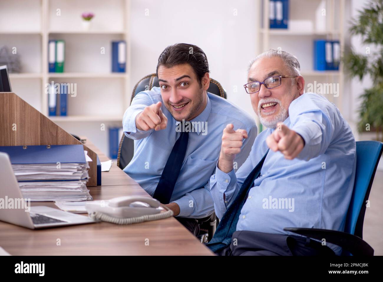 Two colleagues working in the office Stock Photo - Alamy