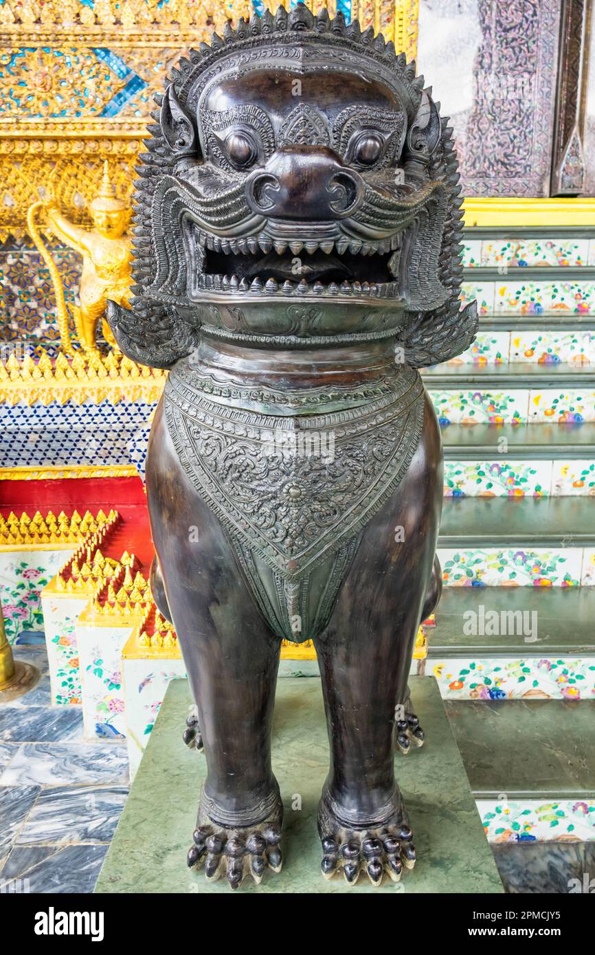 Bronze guardian lion at Wat Phra Kaew in Bangkok, Thailand Stock Photo ...