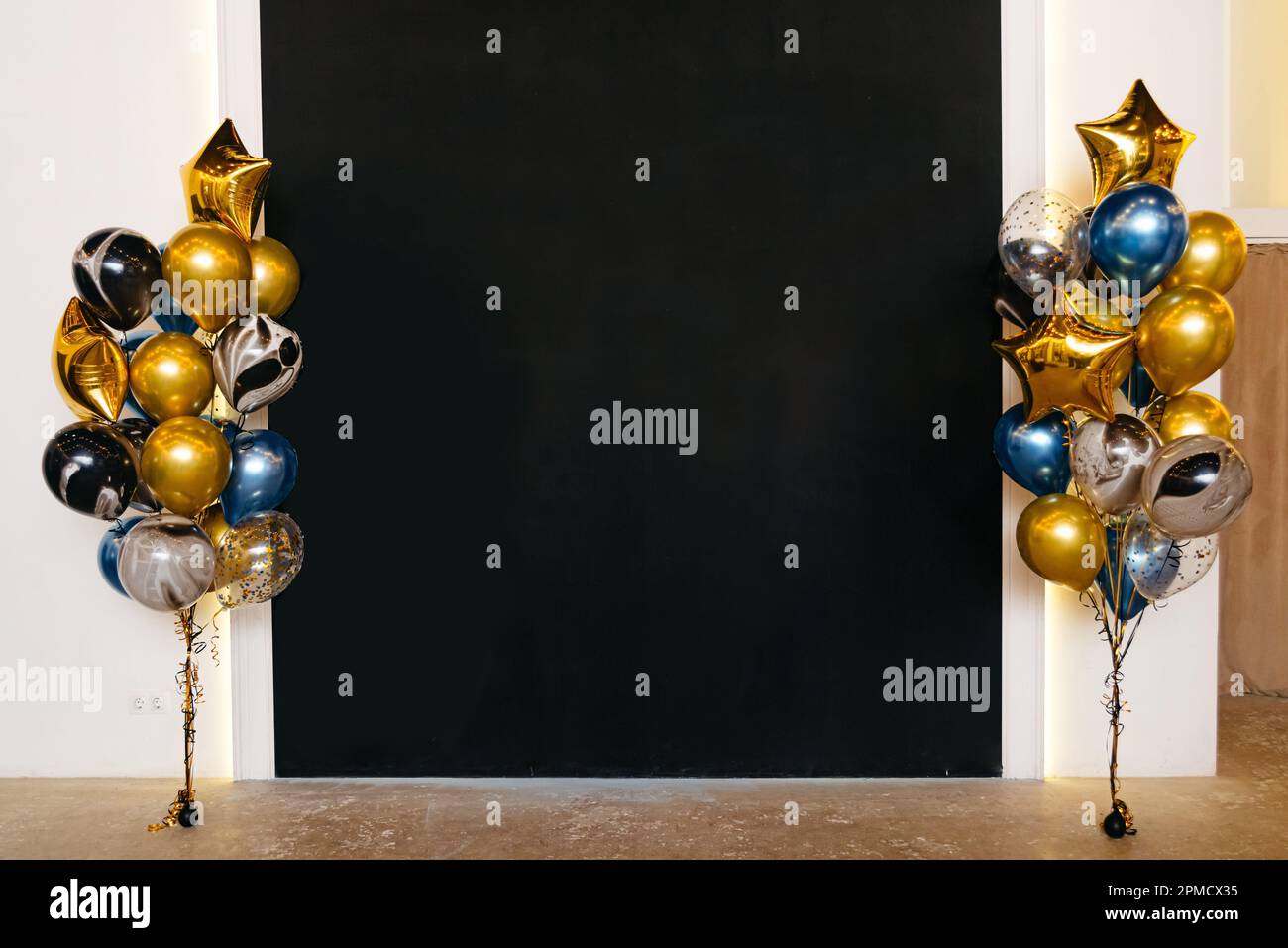 Blackboard with gold and silver balloons with helium. Event decoration ...