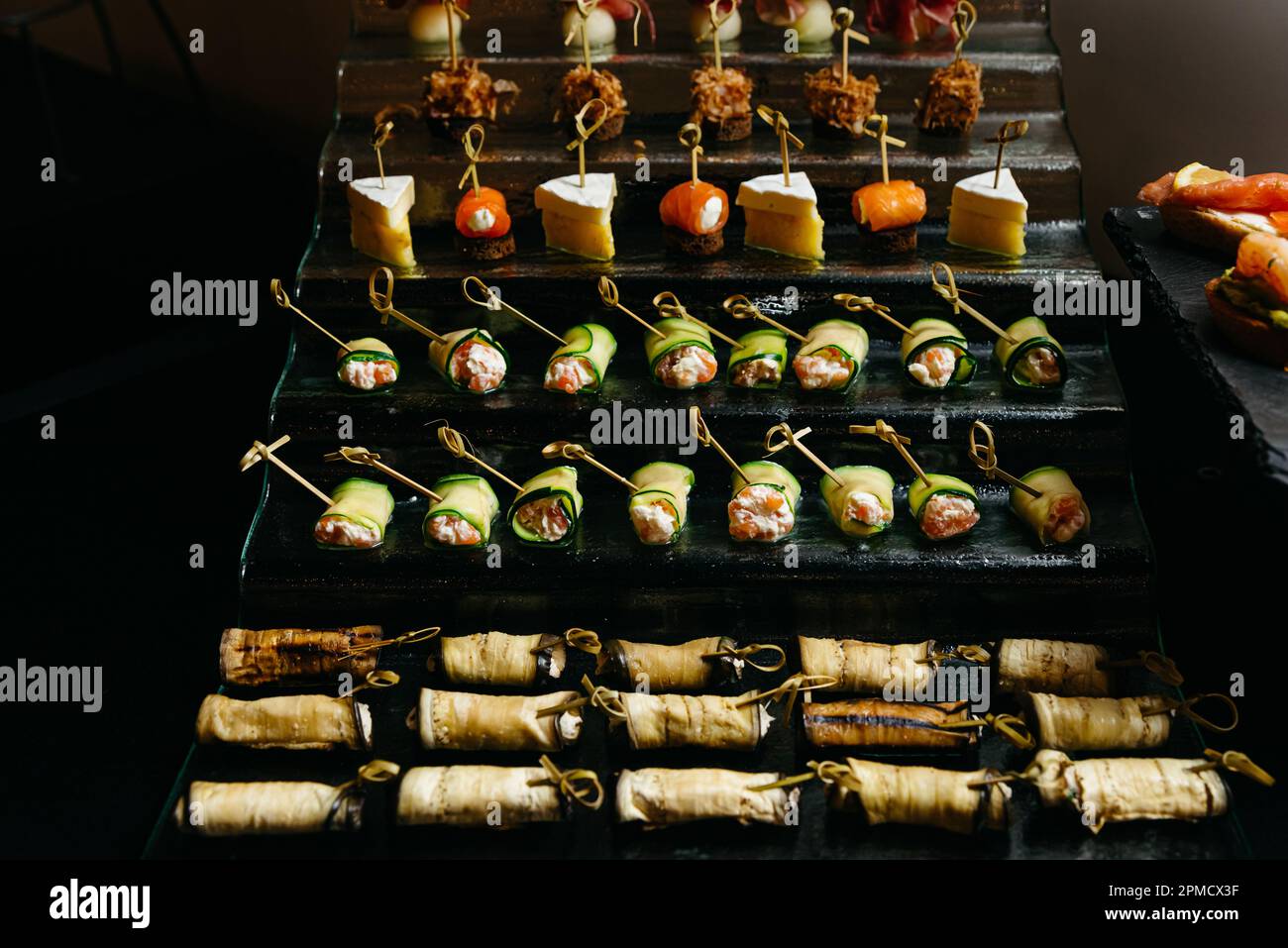 Catering service. Set of different types of rolls and canapes on a ...