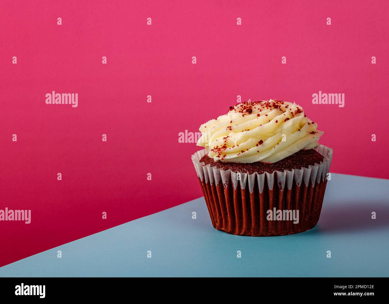 cupcake on solid background Stock Photo - Alamy