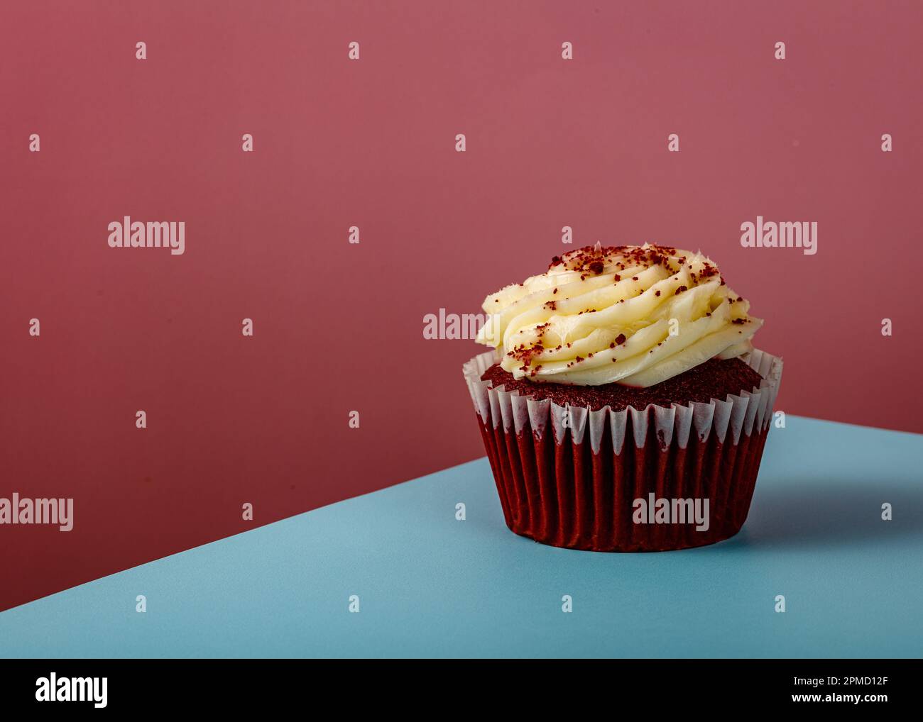 cupcake on solid background Stock Photo - Alamy