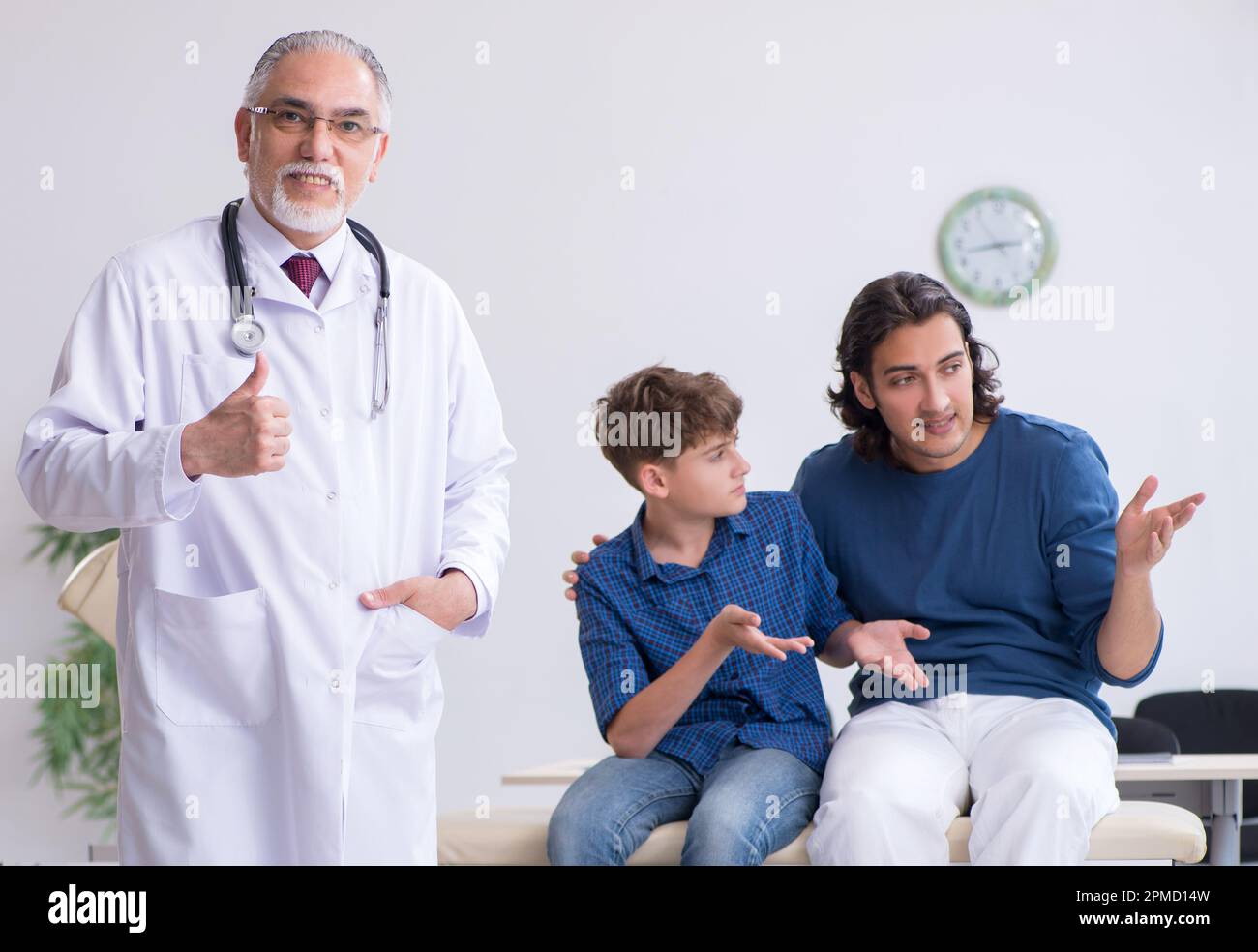 The young boy visiting doctor in hospital Stock Photo - Alamy