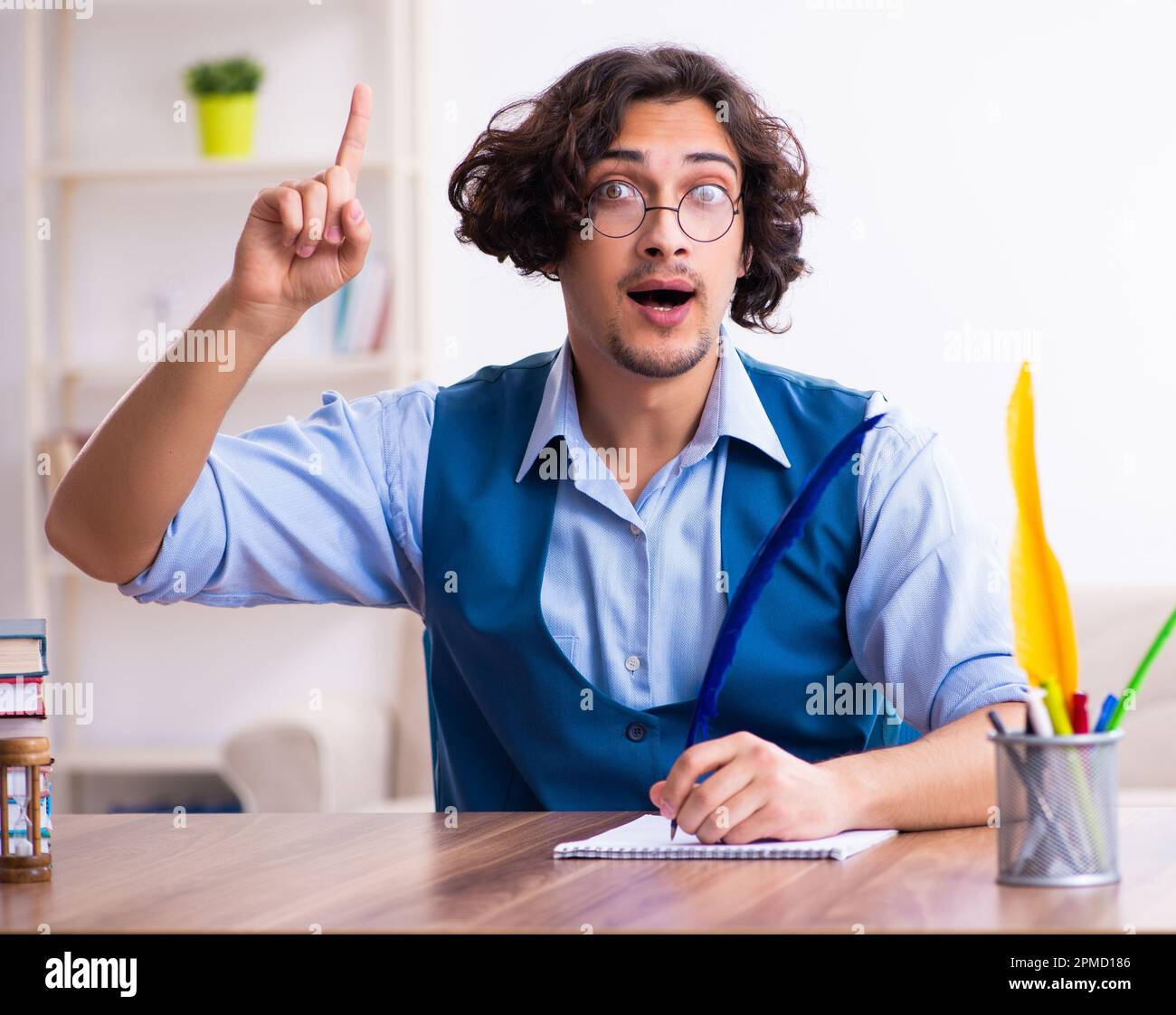 The young writer working on his new work Stock Photo - Alamy