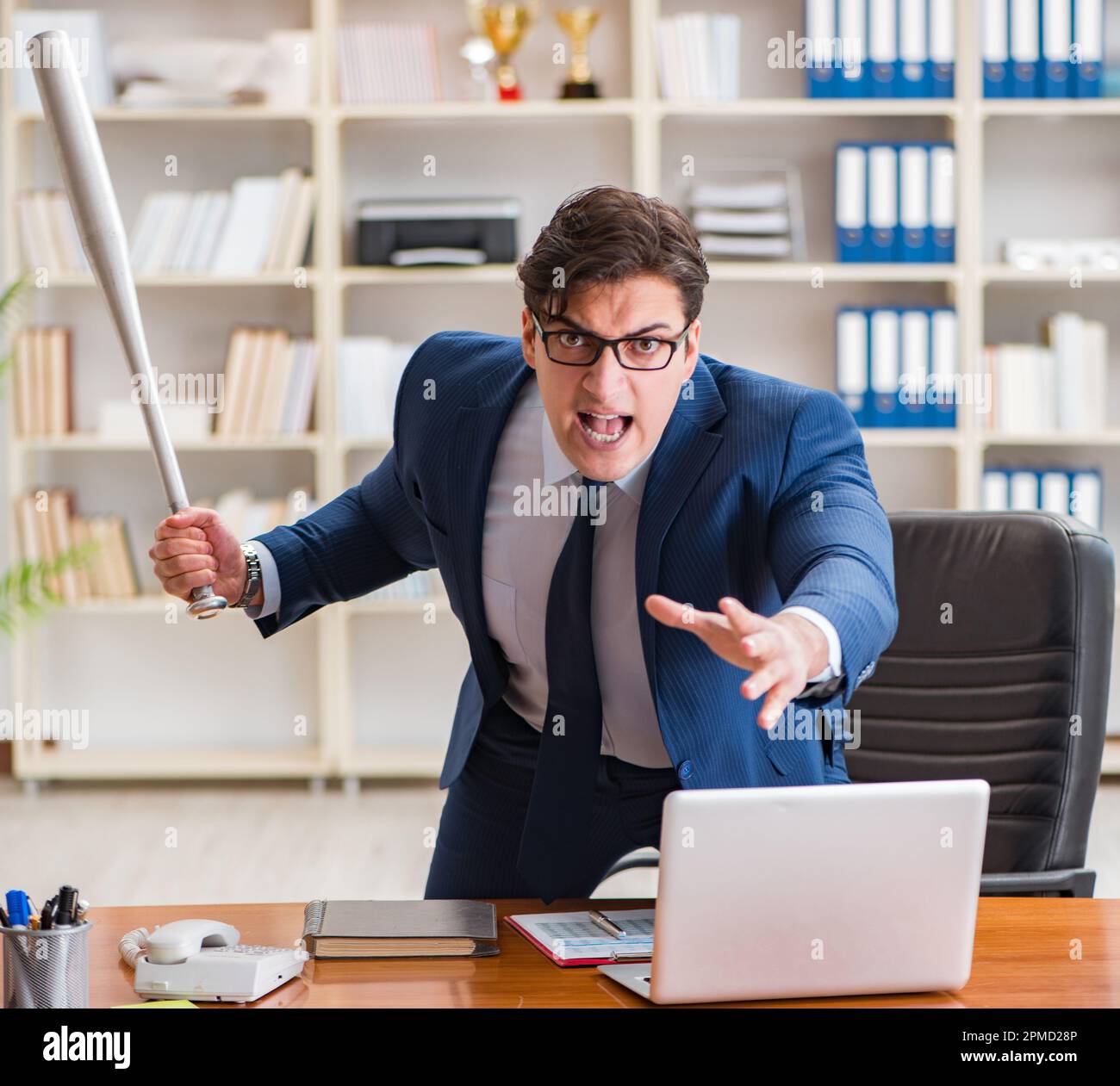 The angry aggressive businessman in the office Stock Photo - Alamy