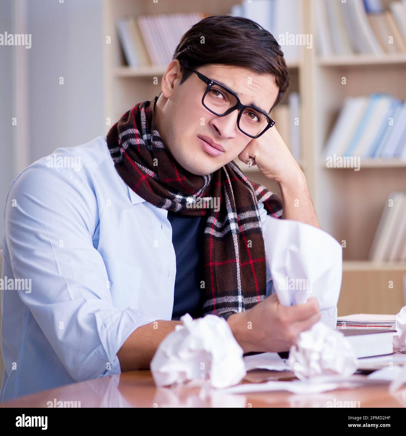 The young writer working in the library Stock Photo - Alamy
