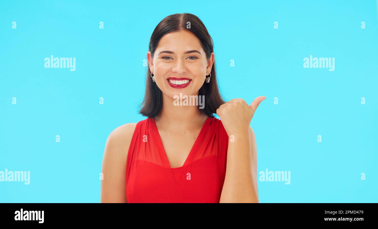 Woman face, pointing and promotion with beauty and smile showing mockup ...