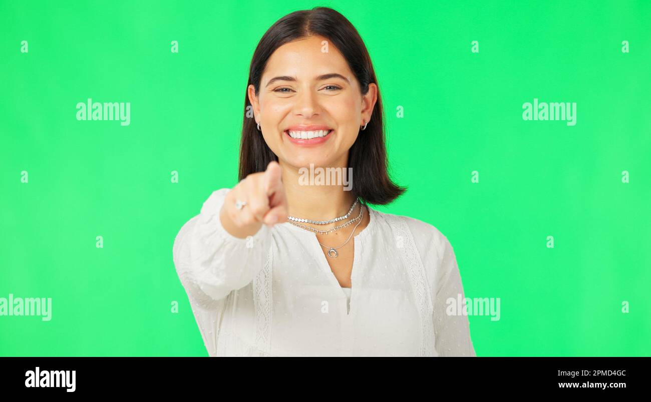 Face, pointing to you and woman with green screen, smile and success on ...