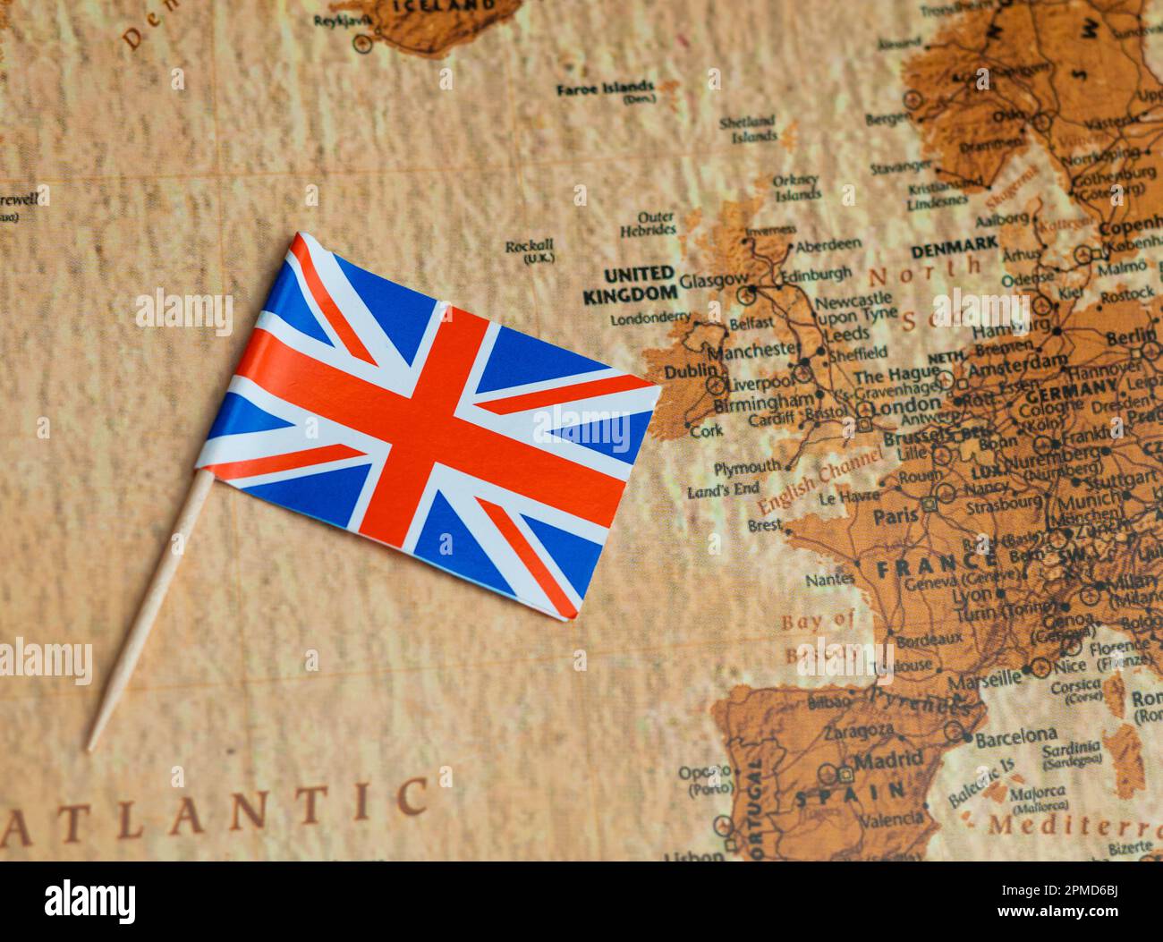 the national union jack flag of great britian ,blue and red on world ...