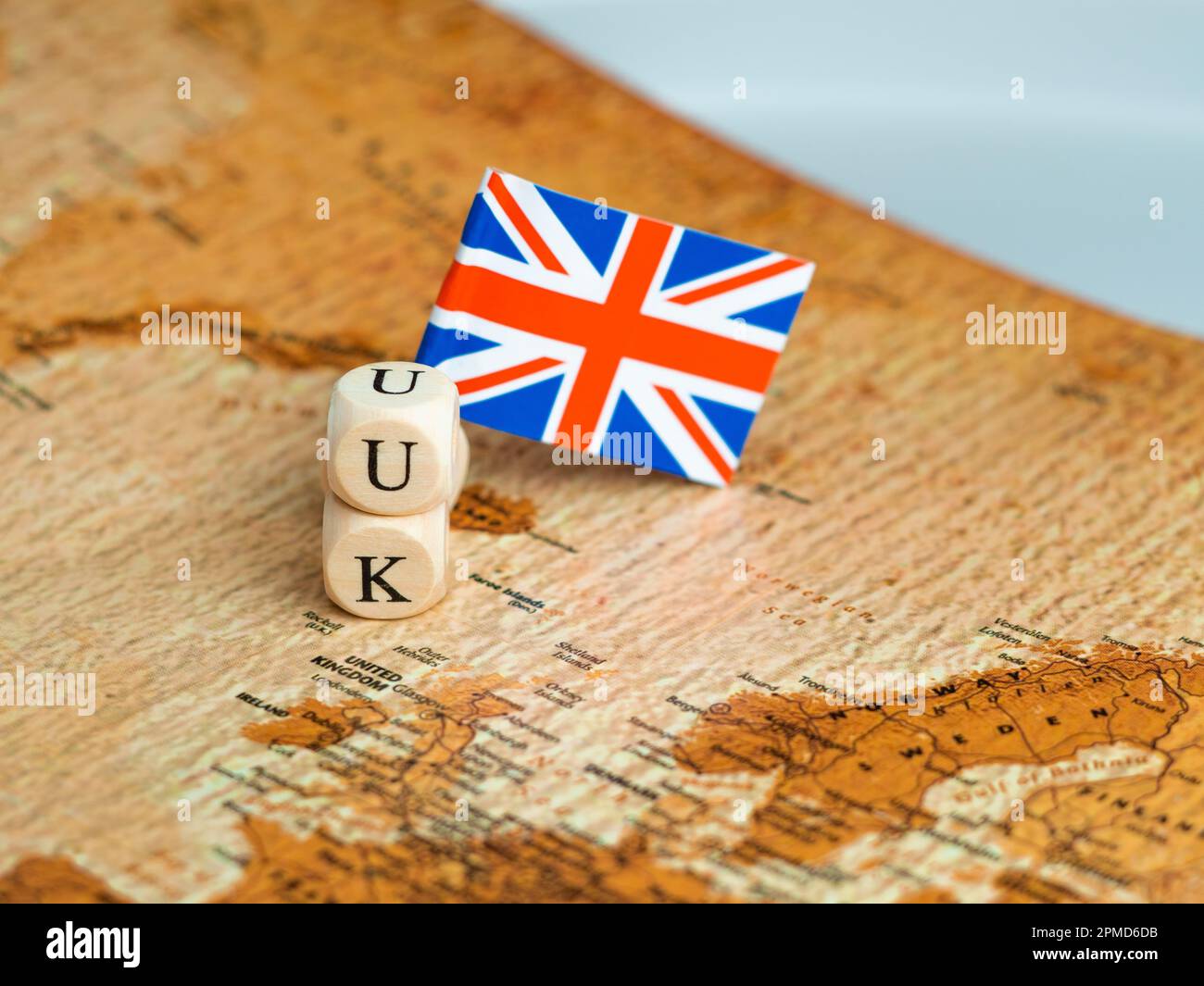 the national union jack flag of great britian ,blue and red on world ...