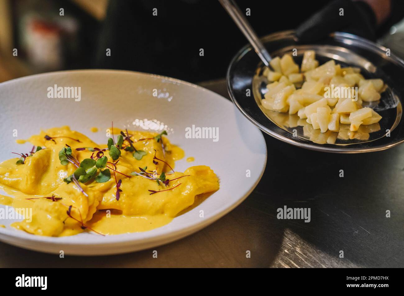 In this photo, we see a plate of homemade Italian pasta with a ...