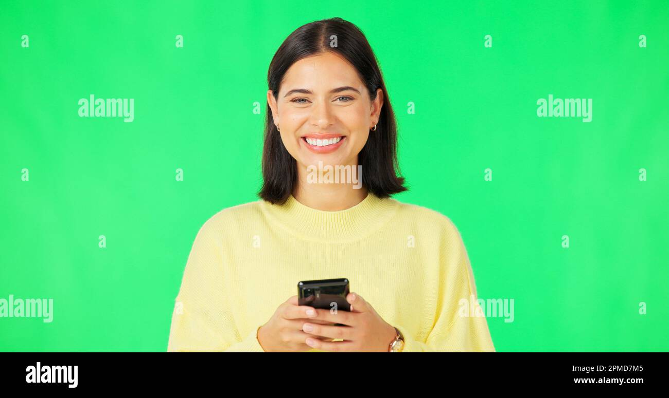 Smile, woman and smartphone on green screen, face and studio for social ...
