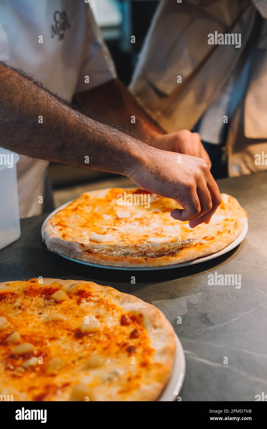 Homemade Italian-style pizza. Freshly kneaded dough, hand crushed ...