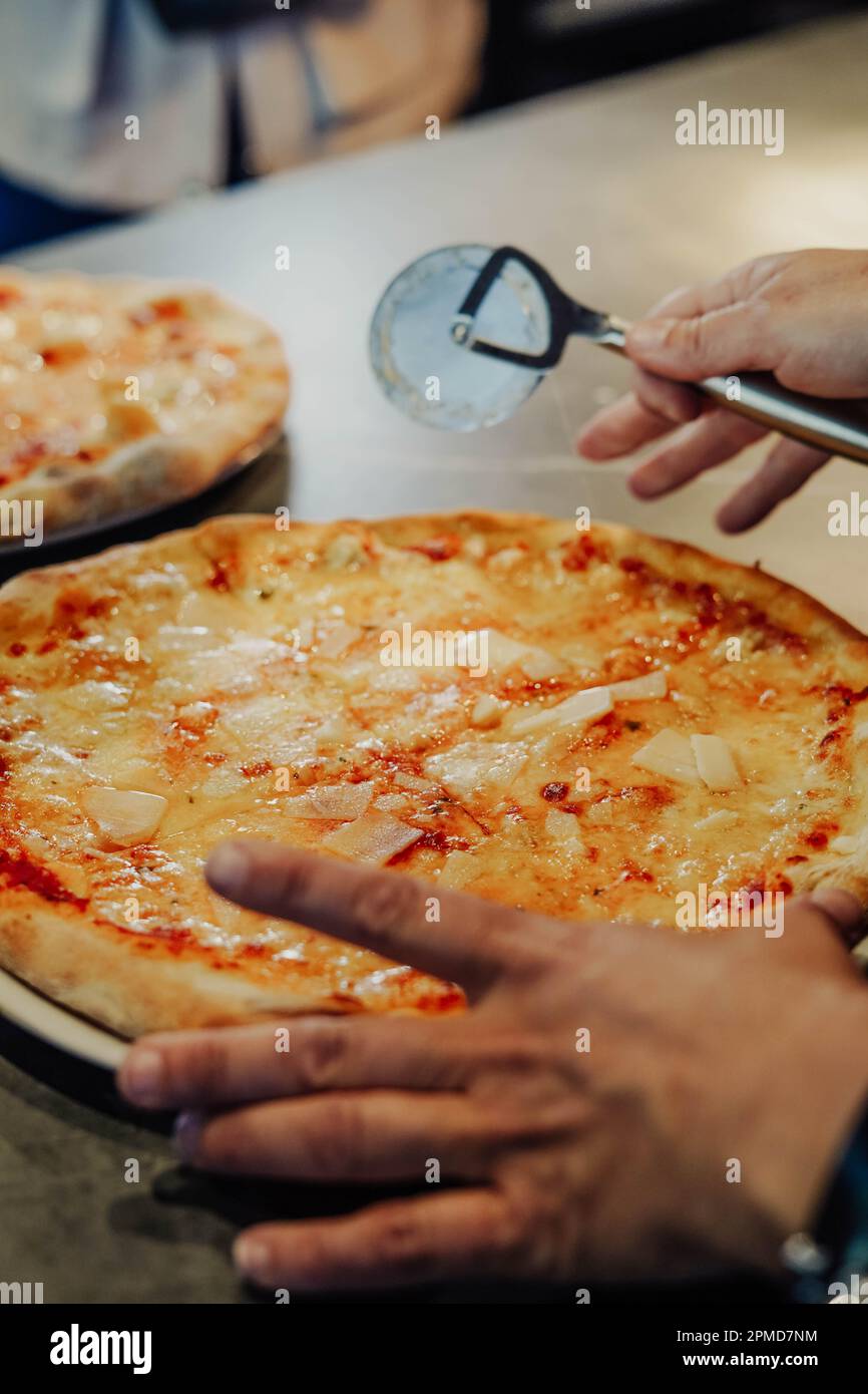 Homemade Italian-style pizza. Freshly kneaded dough, hand crushed ...