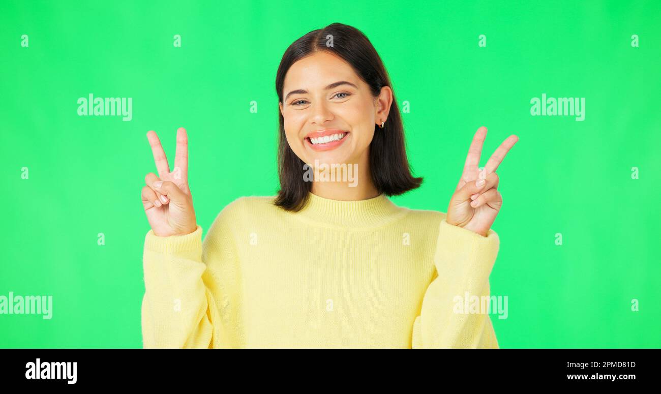 Green screen, funny face expression and happy woman posing with tongue ...