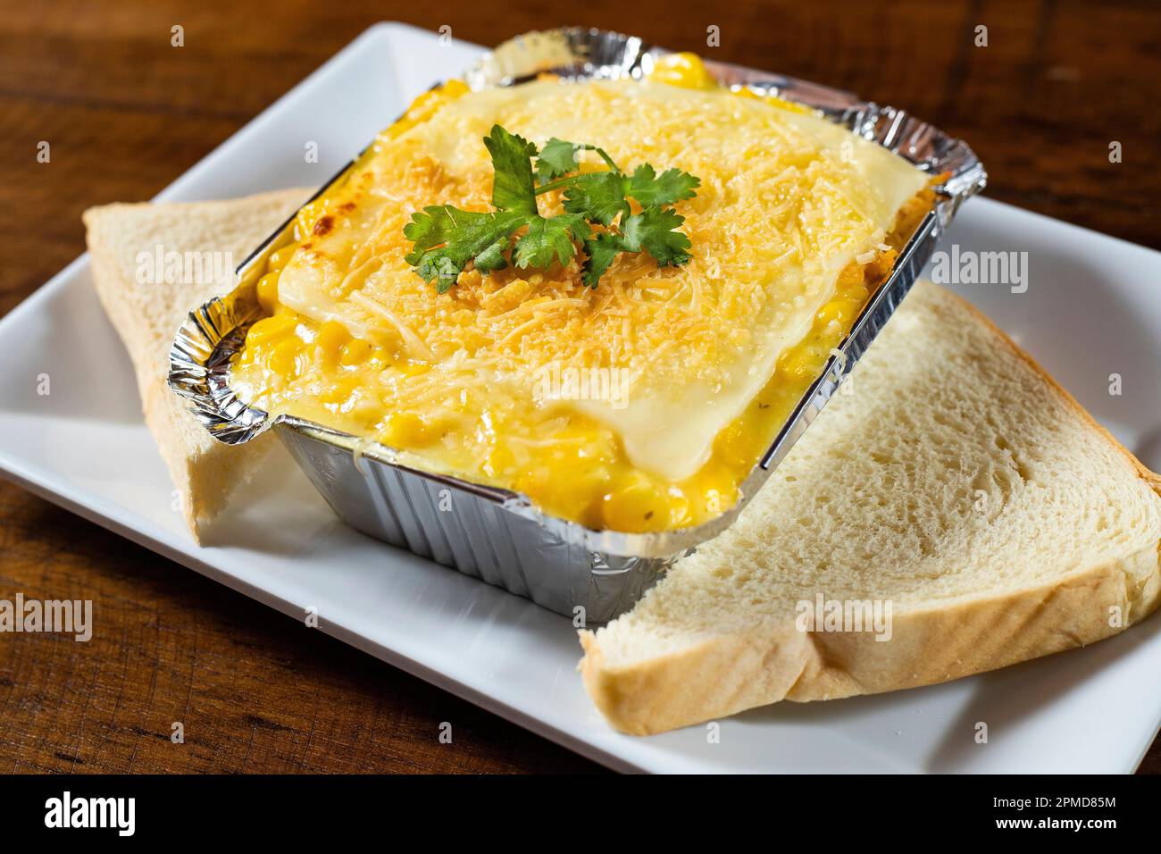 Hot lasagna, served in an aluminum container - Colombian preparation ...