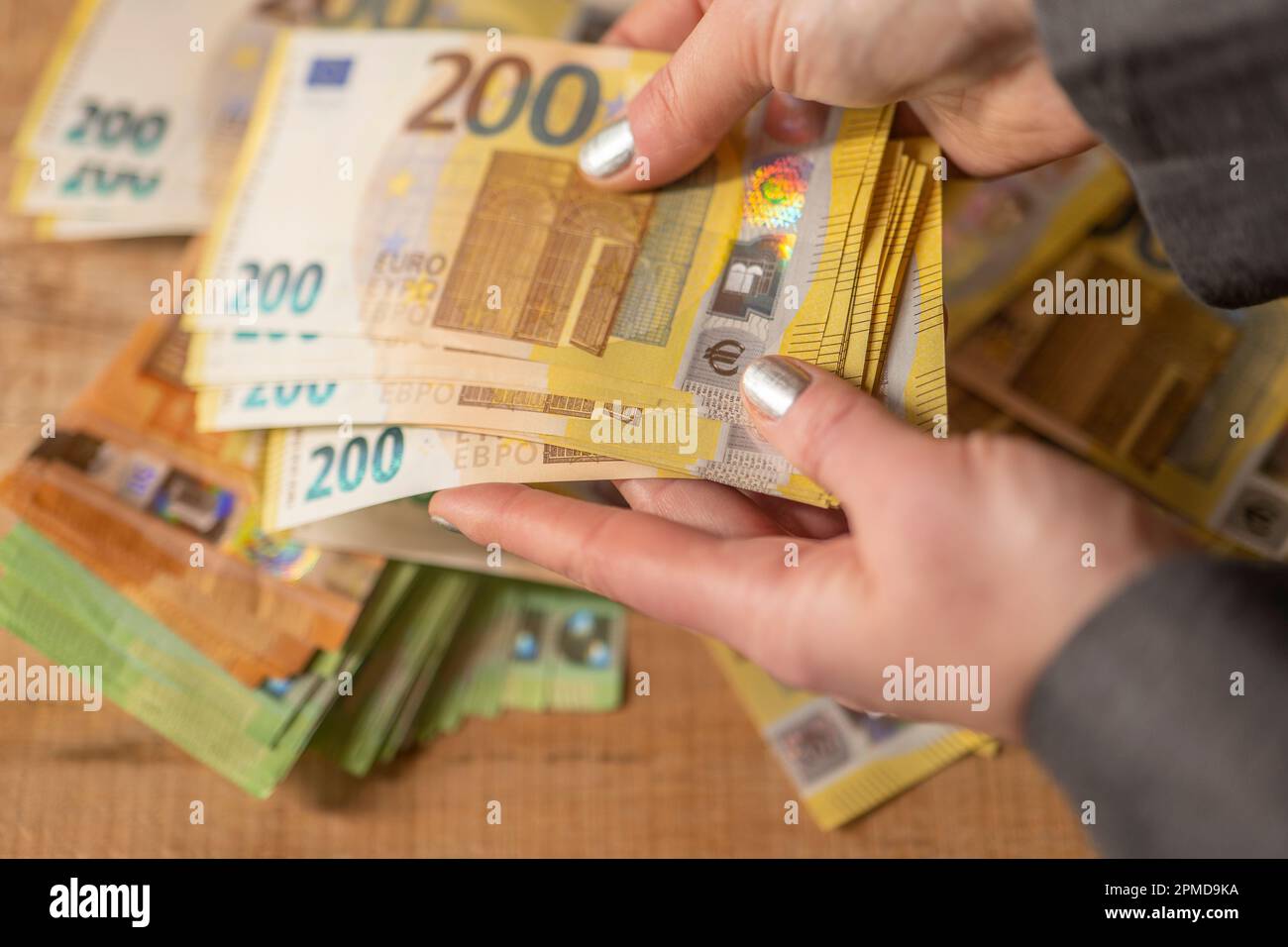 Recalculation of money.200 euro banknotes. Counting euro banknotes ...