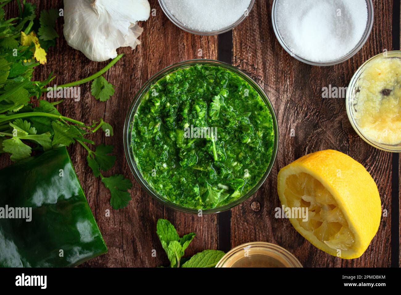 Cilantro-Mint Chutney in a Small Glass Bowl Surrounded by Ingredients ...