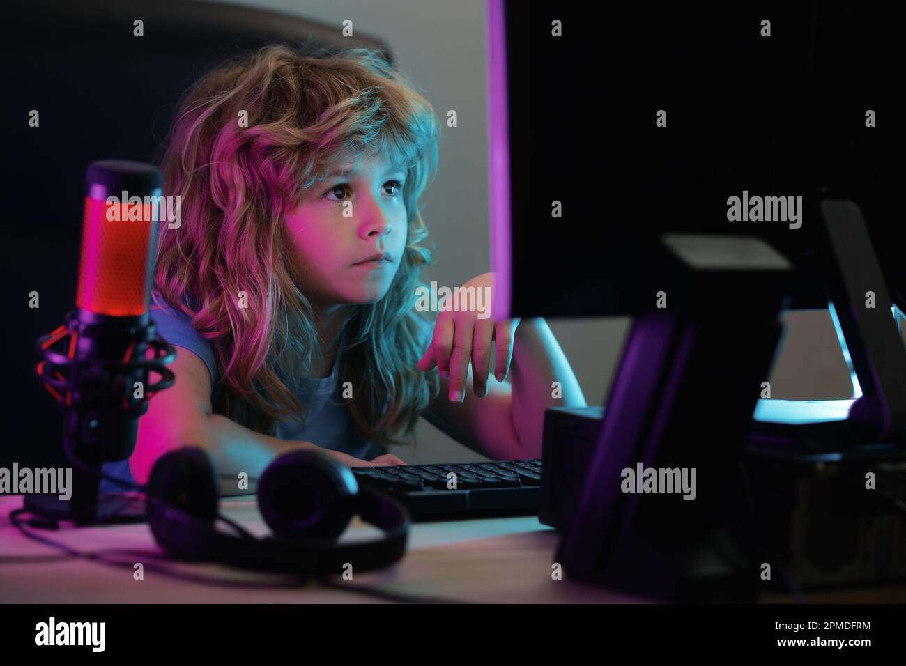 Little boy at the pc computer screen. Cute preschool kid is watching ...