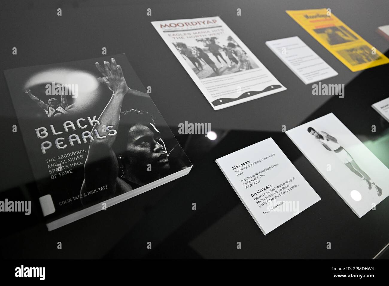 A copy of the book ‘Black Pearls’ by Colin Tatz and Paul Tatz is shown ...