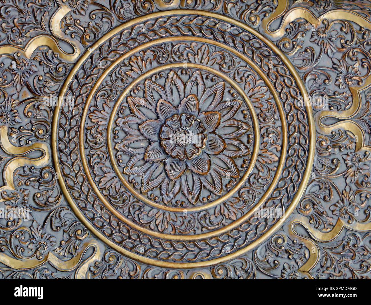Oval decorative carved golden metal floral pattern background Stock ...