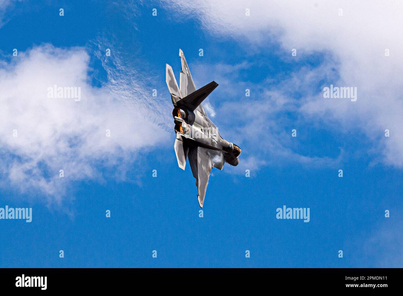 U.S. AIR FORCE ACADEMY, Colo. – Two F-22 Raptors perform a flyover and ...