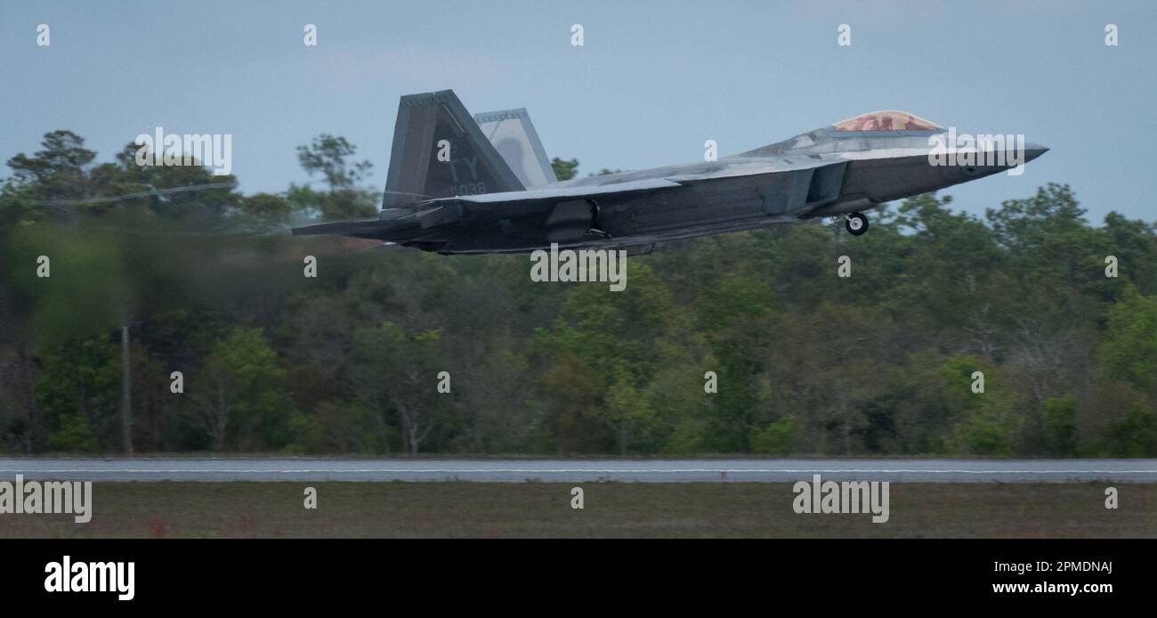 Maj. Brett Gedman, 301st Fighter Squadron, lifts off in an F-22A Raptor ...