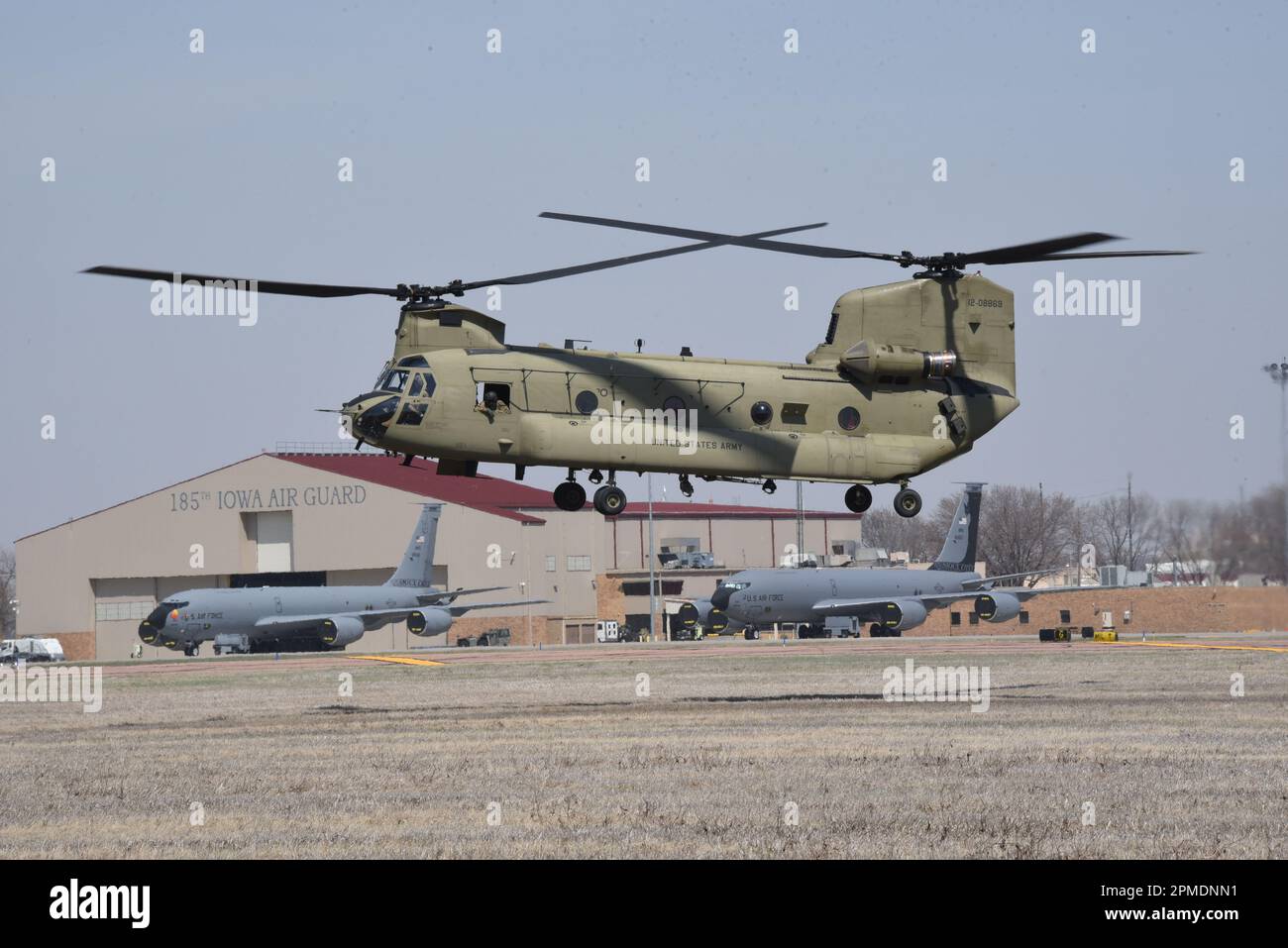 An Iowa Army National Guard CH-47 Chinook helicopter picks up a ...
