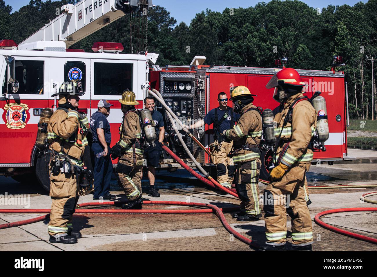 U.S. Marines with Aircraft Rescue and Firefighting (ARFF), Headquarters and Headquarters ...
