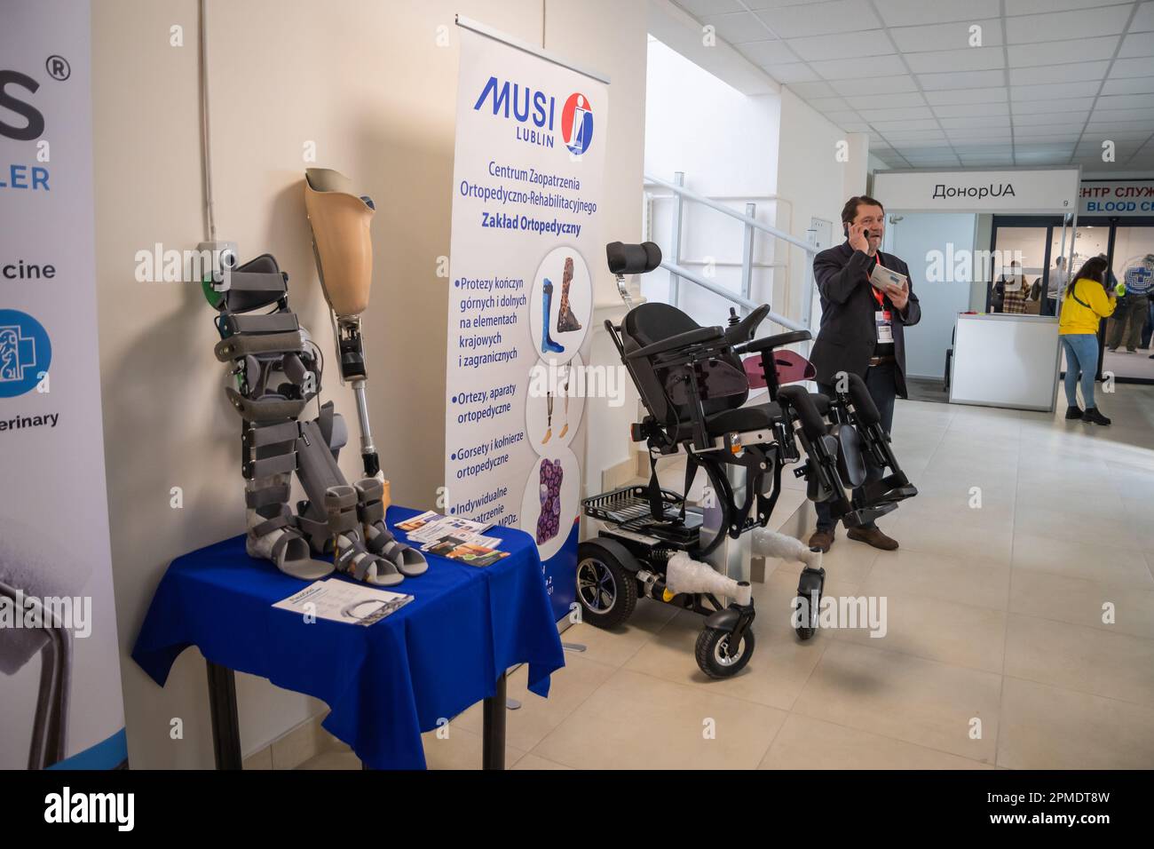 A man stands near the latest equipment for physical rehabilitation at ...