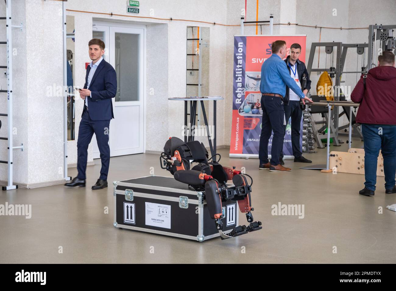 A man stands near the latest equipment for physical rehabilitation at ...