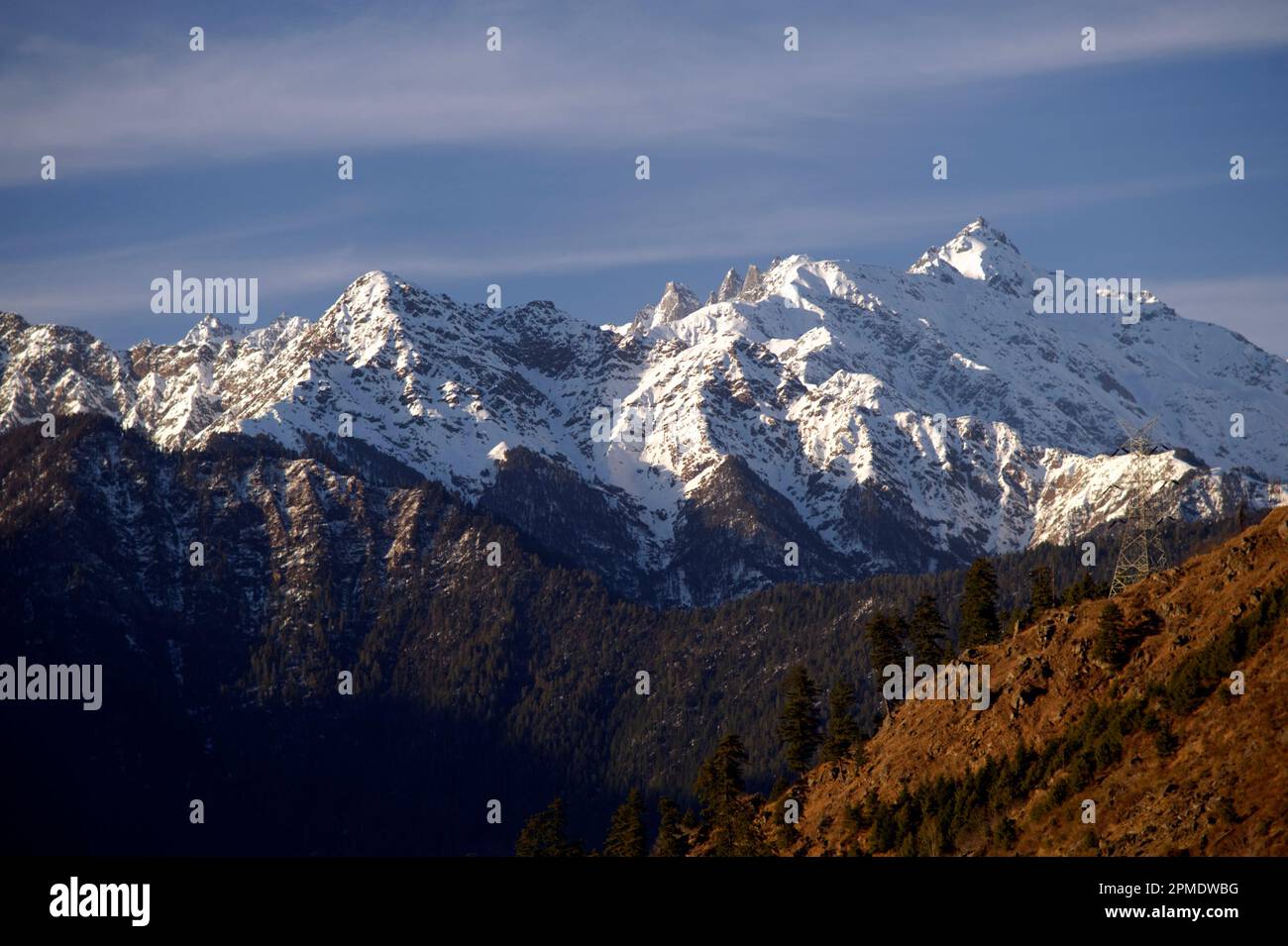 View of a Himalayas snow covered peaks from Sarahan of state Himachal ...