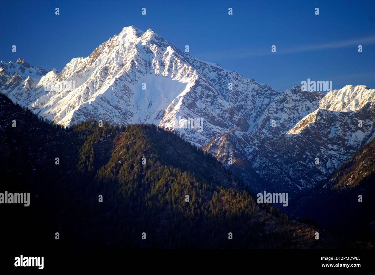 View of a Himalayas snow covered peaks from Sarahan of state Himachal ...