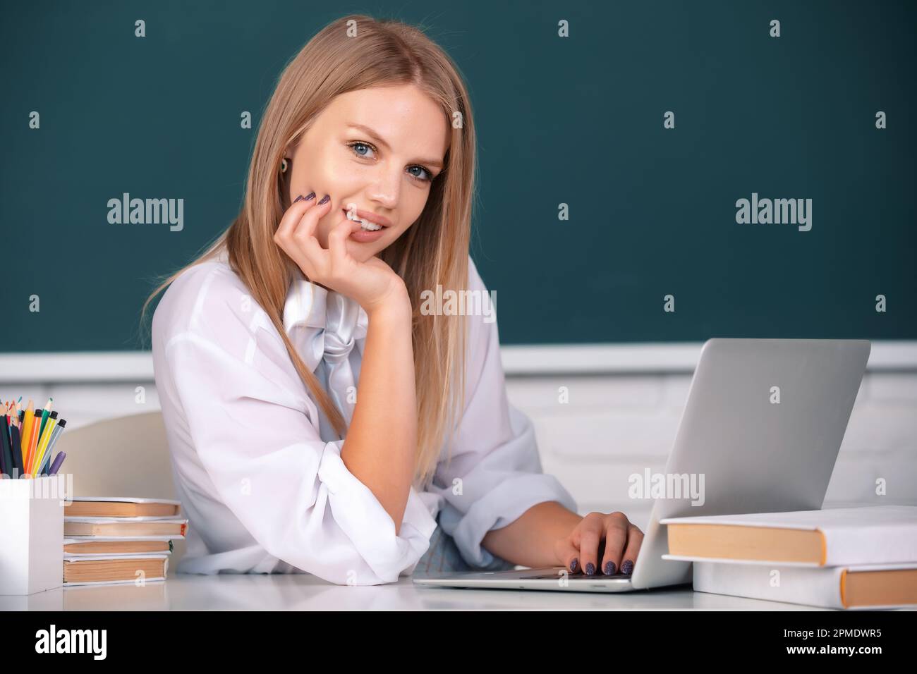 Portrait of female university student study lesson at school or ...